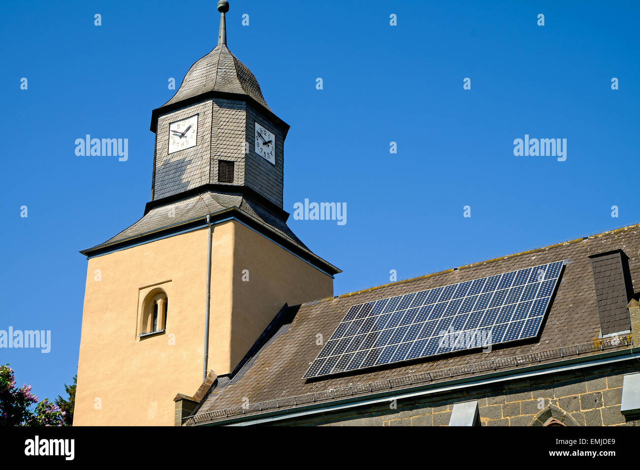 An old church with solar panels on the roof Stock Photo - Alamy