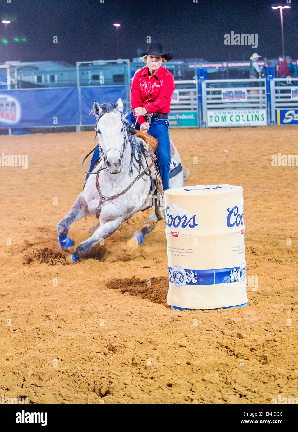 Cowgirl Participating in a Barrel racing competition in the Clark ...