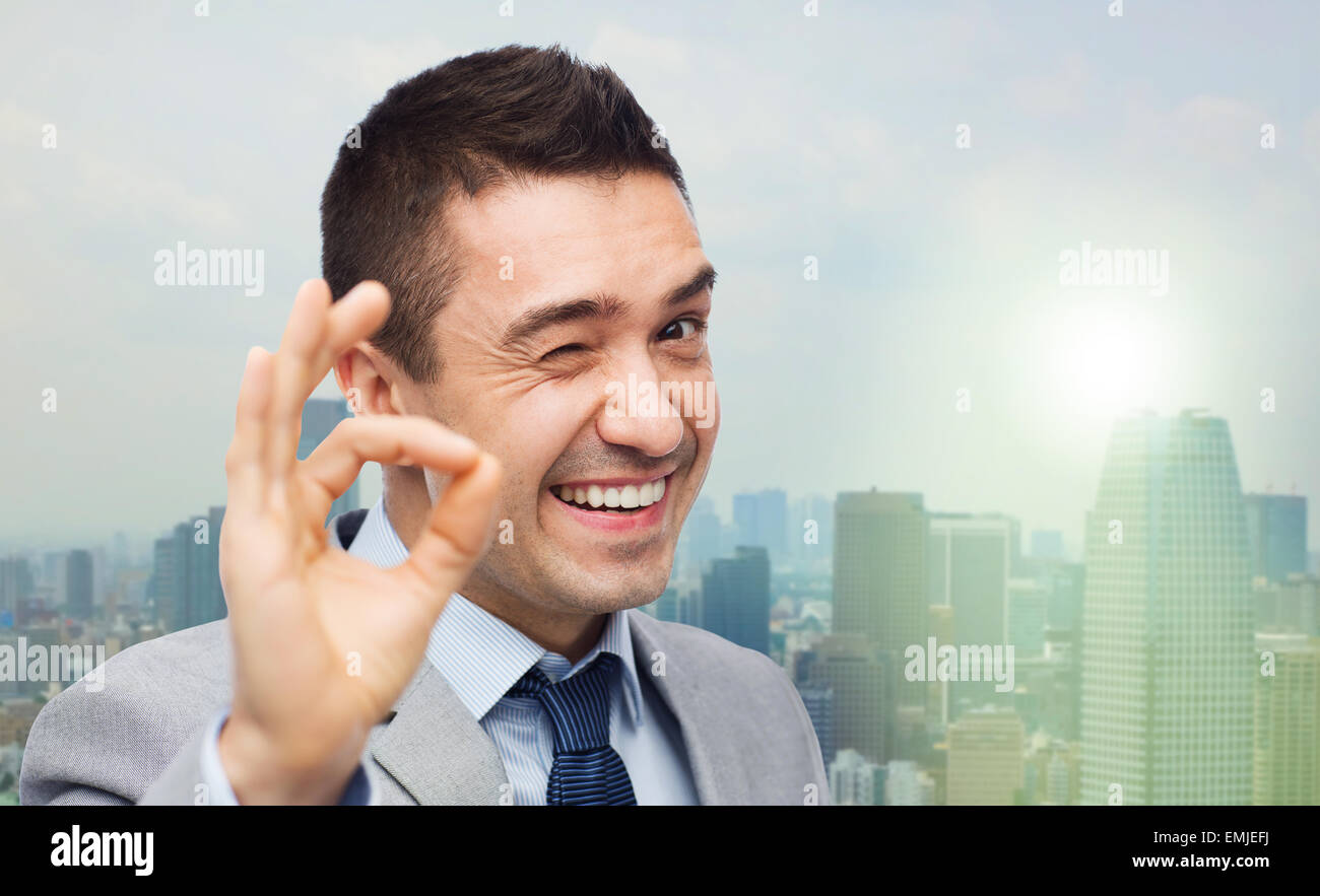 happy businessman in suit showing ok hand sign Stock Photo - Alamy
