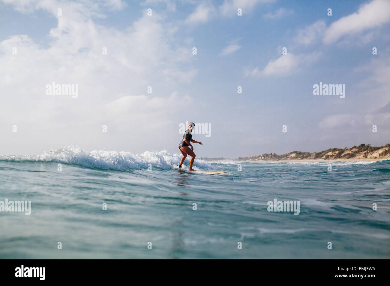 surfing woman with surfing board back view Stock Photo - Alamy