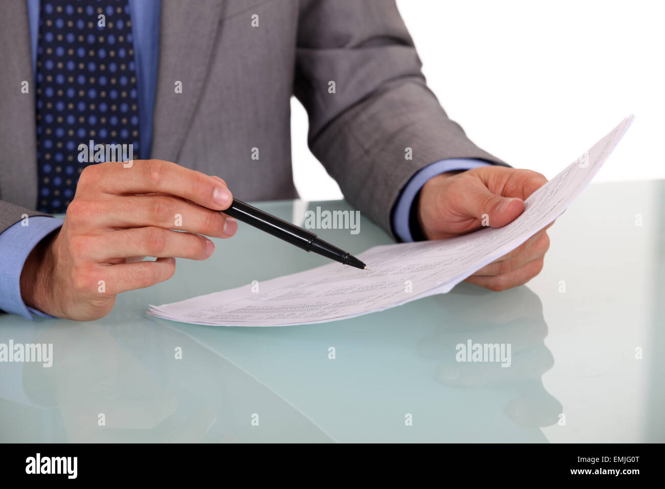 Man checking document before signing Stock Photo - Alamy