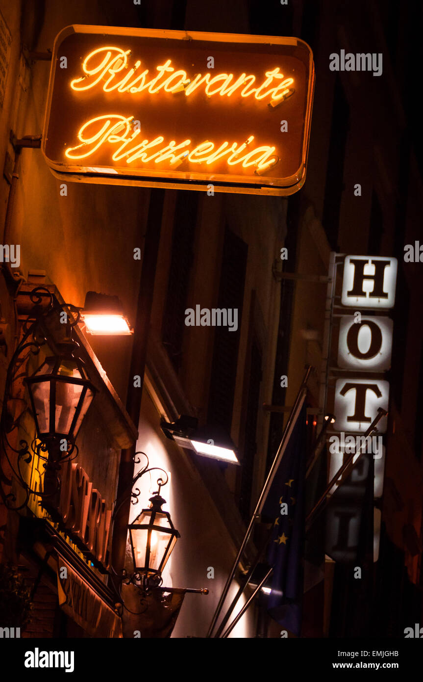 Pizzeria restaurant neon light with hot in the background, Rome, Italy ...