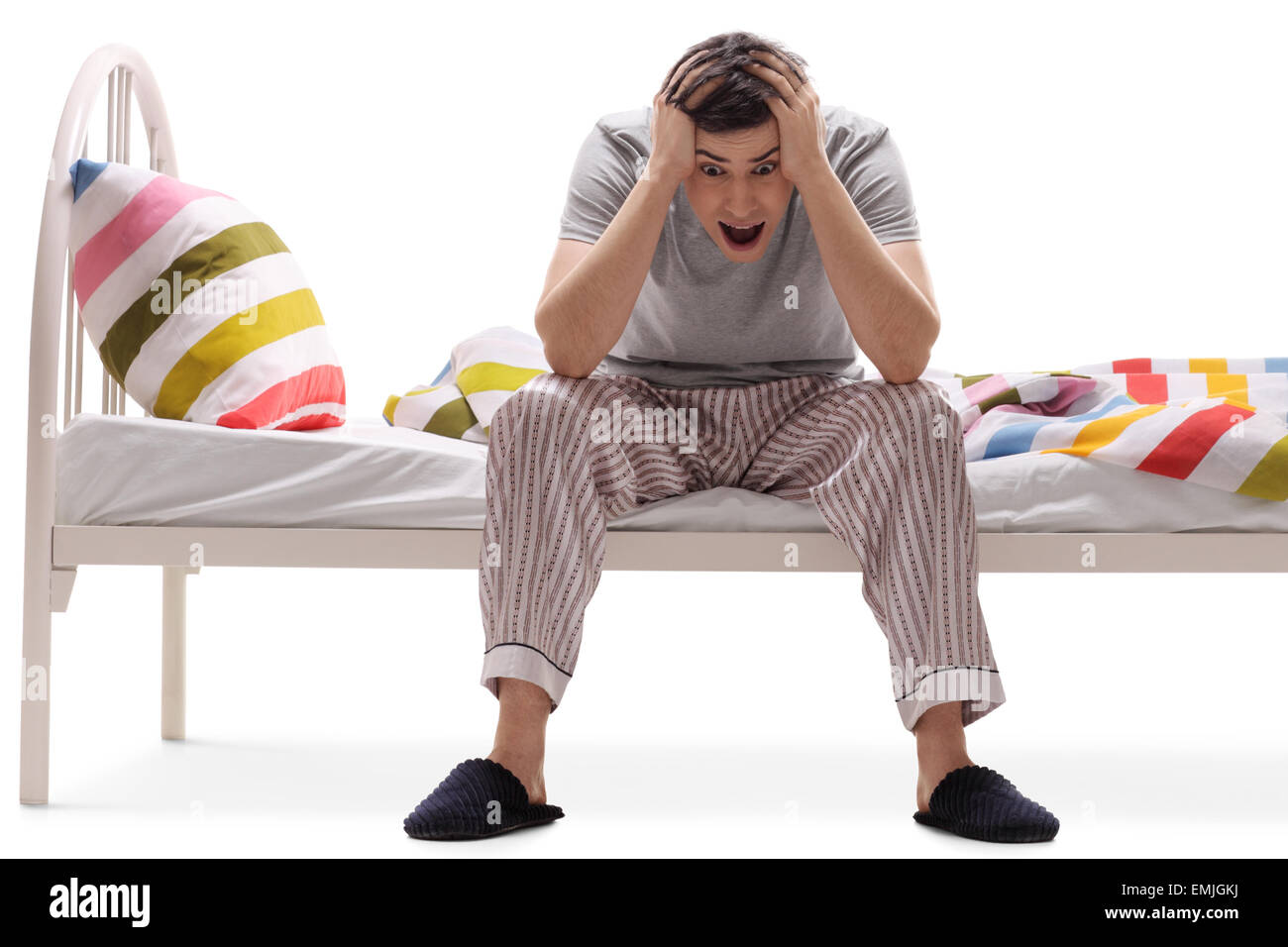 Young man suffering from insomnia isolated against white background ...