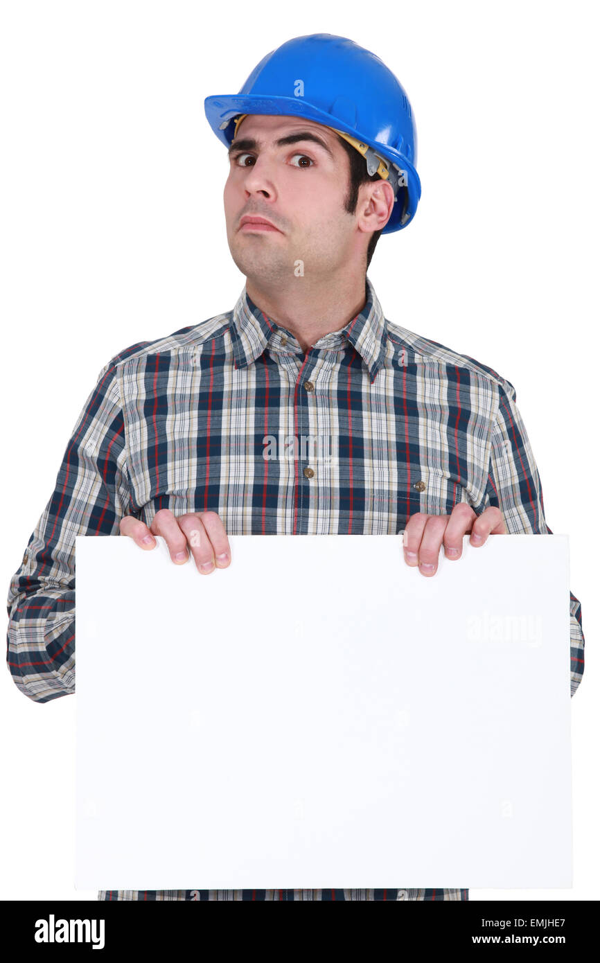 Unsure construction worker Stock Photo - Alamy
