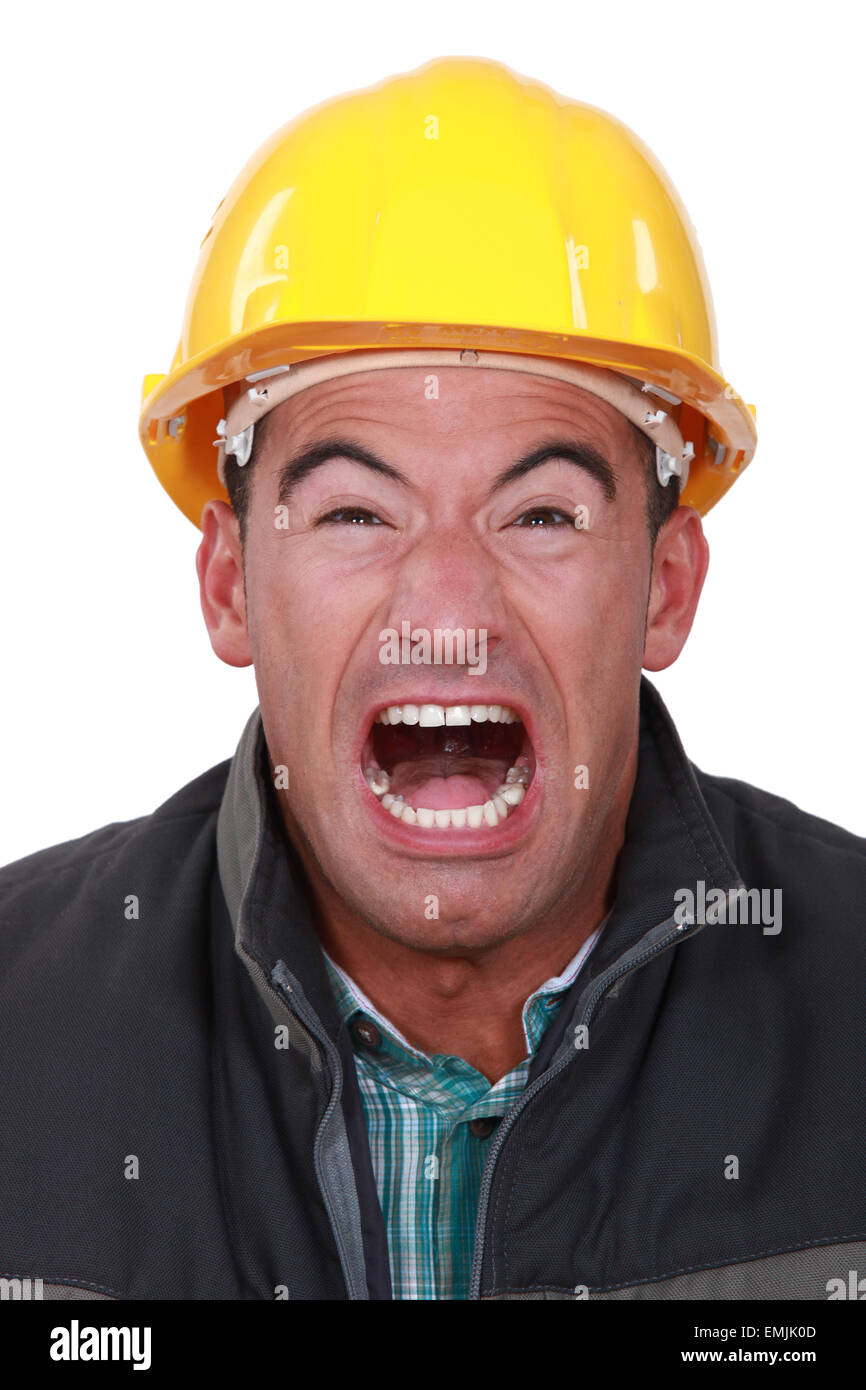 Construction worker screaming Stock Photo - Alamy