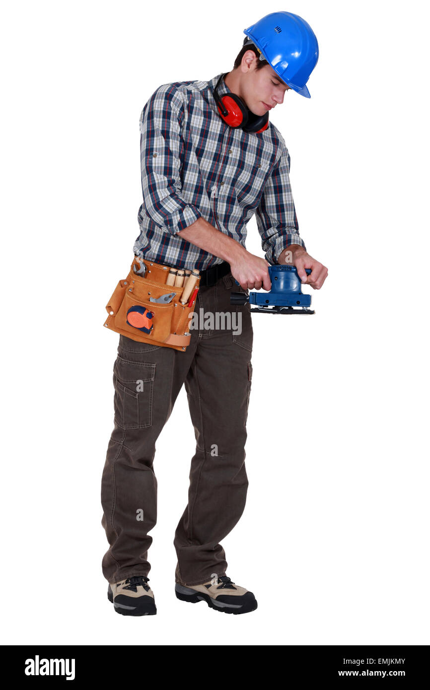 Man using sander Stock Photo - Alamy