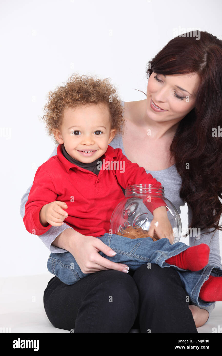 A cute kid eating cookie Stock Photo - Alamy