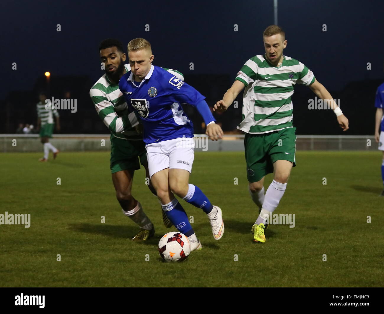 Nantwich, UK. 21st April, 2015. Macclesfield Town's Danny Rowe battles ...