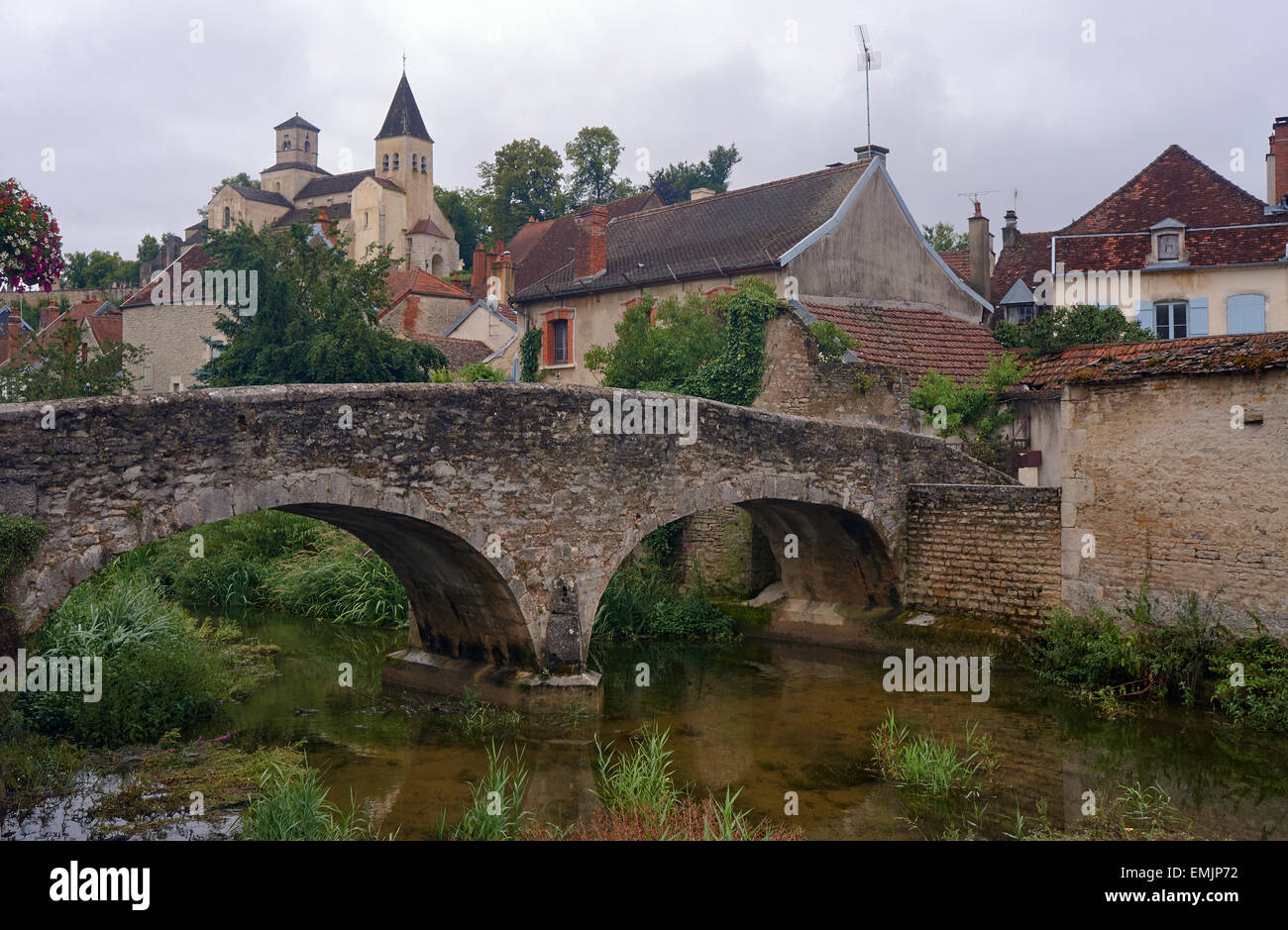 Stone bridge and medieval buildings in a small town in France Stock ...