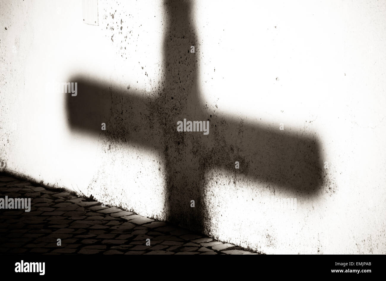 Religious cross and shadow hi-res stock photography and images - Alamy