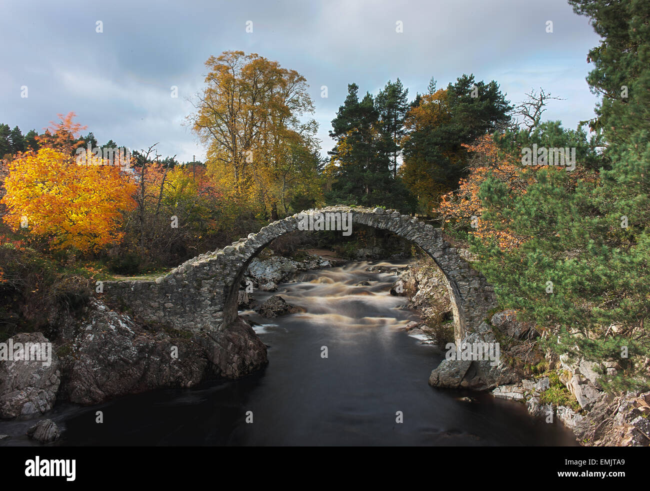 Packhorse Bridge, over the River Dulnain, in Carrbridge in the Scottish ...