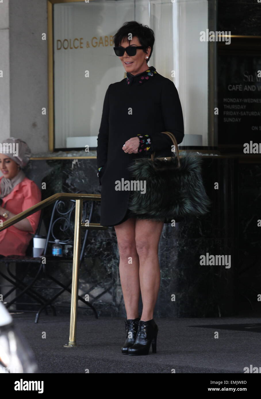 Kris Jenner spotted out wearing a black mini dress and carrying a furry ...