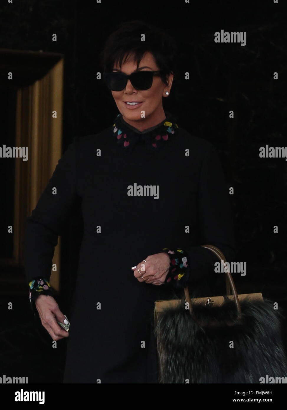 Kris Jenner spotted out wearing a black mini dress and carrying a furry ...