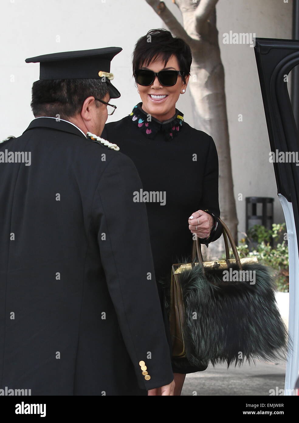 Kris Jenner spotted out wearing a black mini dress and carrying a furry ...