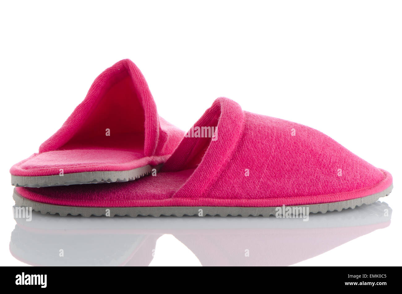 A pair of pink slippers on a white background Stock Photo - Alamy