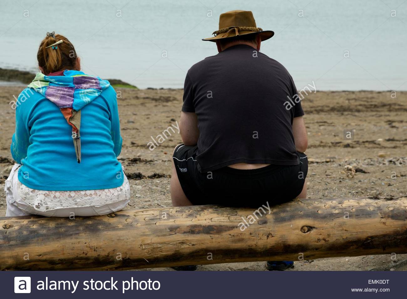 Man And Woman Looking Out To Sea Stock Photos & Man And Woman Looking ...