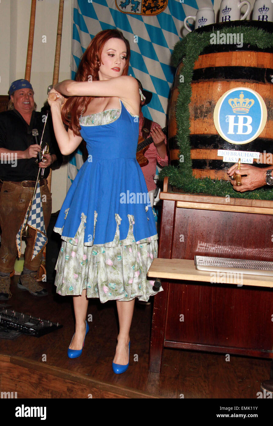 'The Girls Next Door' star Holly Madison taps the Oktoberfest keg at ...