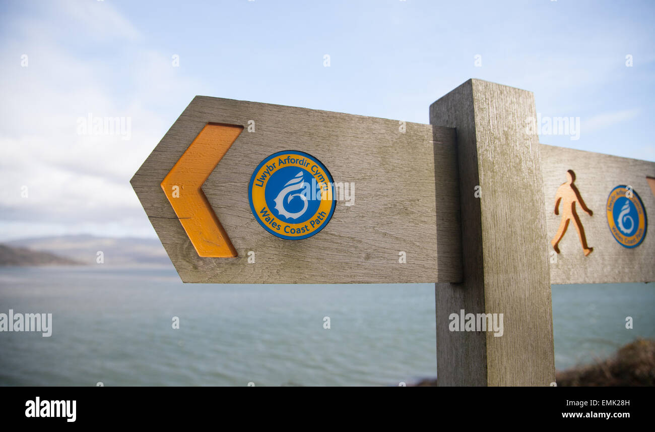 Close-up creative shot of Wales Coastal Path oak Signage and footpath ...