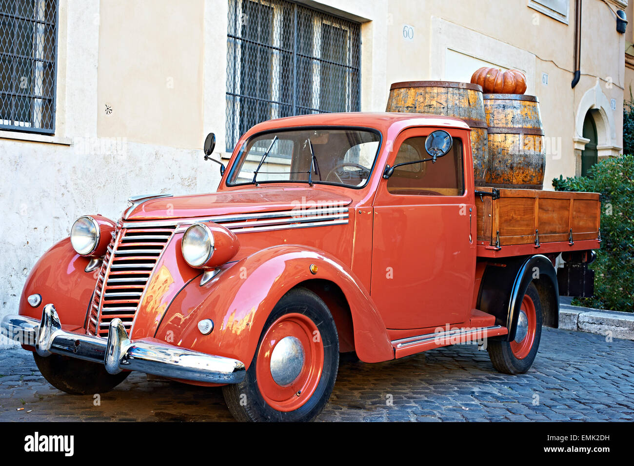 Vintage red van with old wooden barrels with wine Stock Photo - Alamy