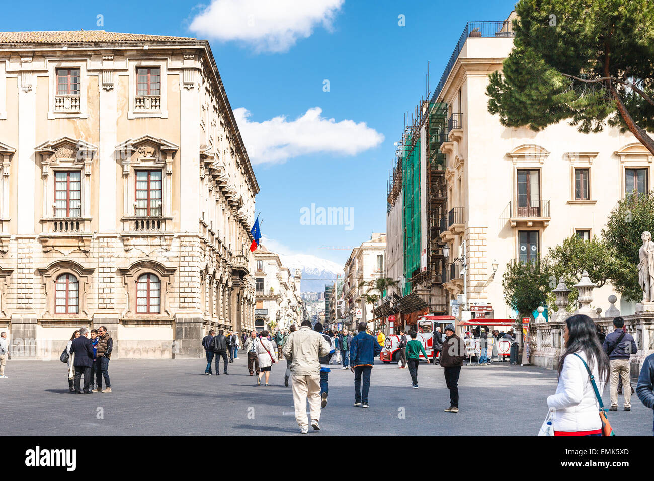 CATANIA, ITALY - APRIL 5, 2015: tourists at via Etnea and view Etna ...
