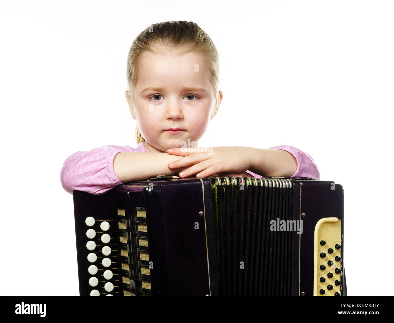 Cute little girl playing harmonica, isolated on white, music education ...