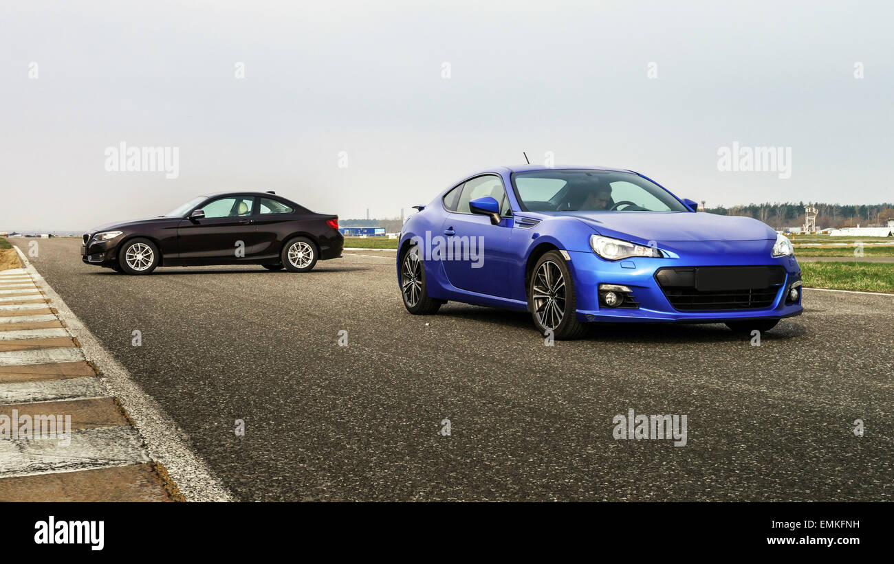 Two sport car comperison on race way track Stock Photo - Alamy