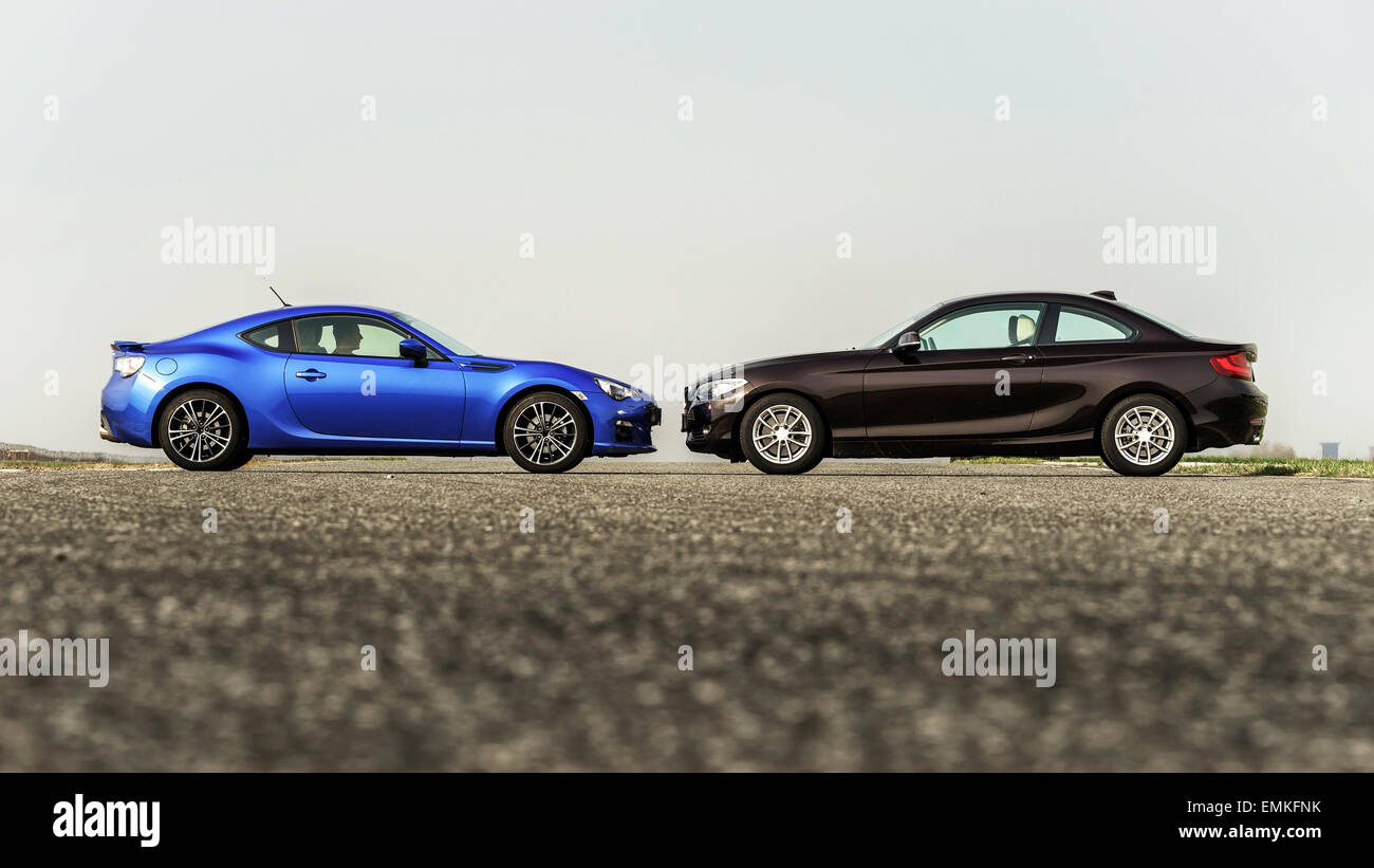 Two sport car comperison on race way track Stock Photo - Alamy
