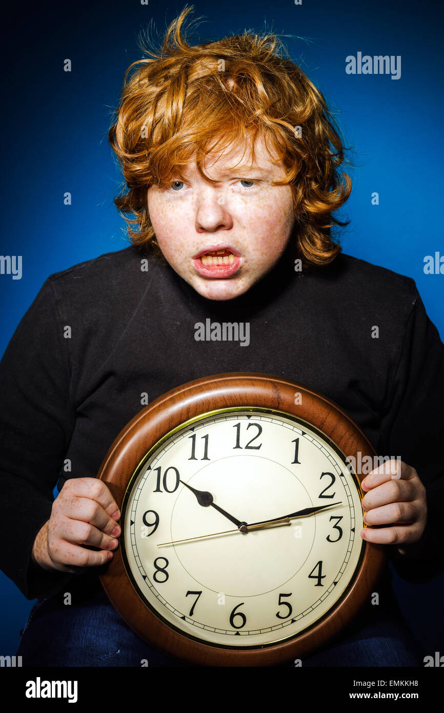 Boy showing clock hi-res stock photography and images - Alamy