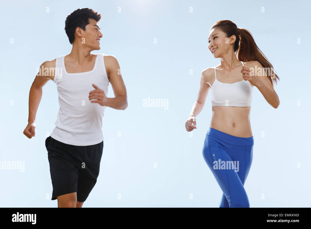 Couple running outdoors hi-res stock photography and images - Alamy