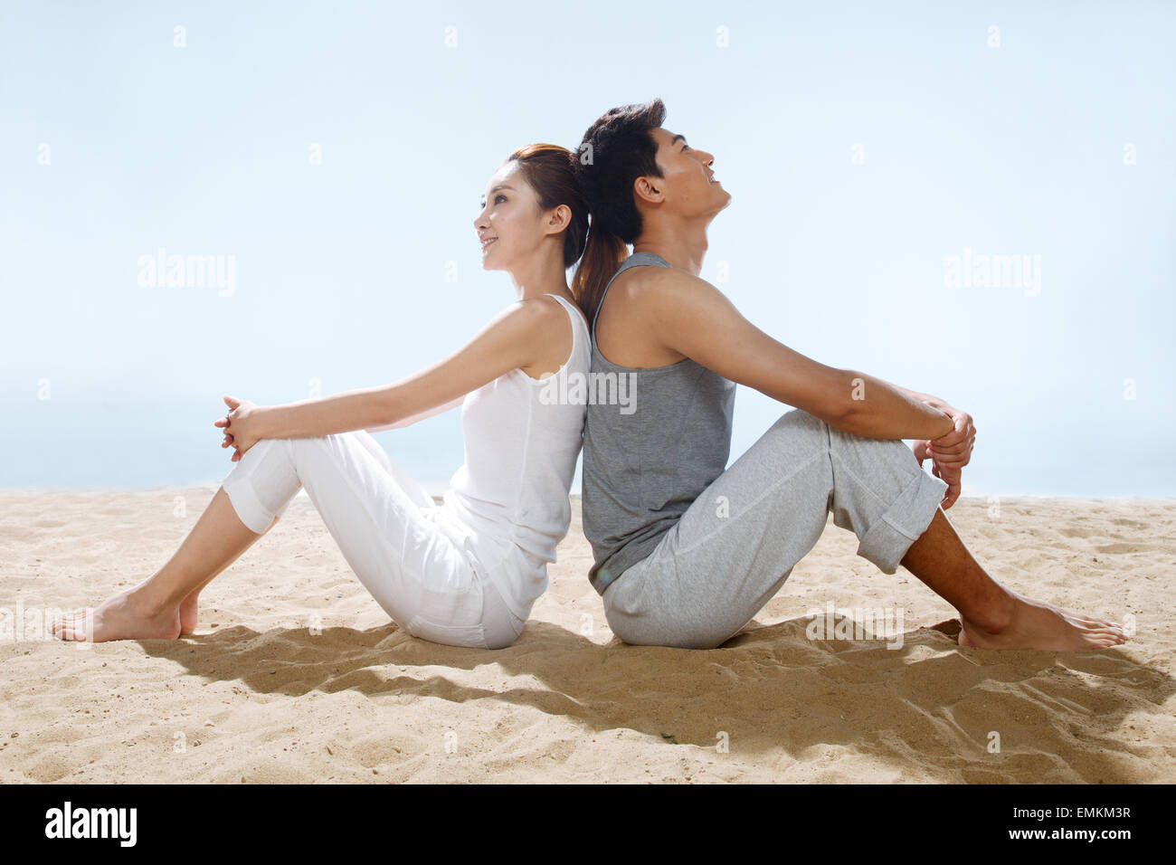 Indian couple sitting back back hi-res stock photography and images - Alamy