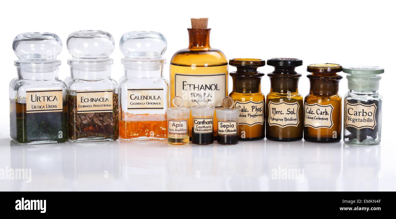 Various pharmacy bottles of homeopathic medicine on white background ...