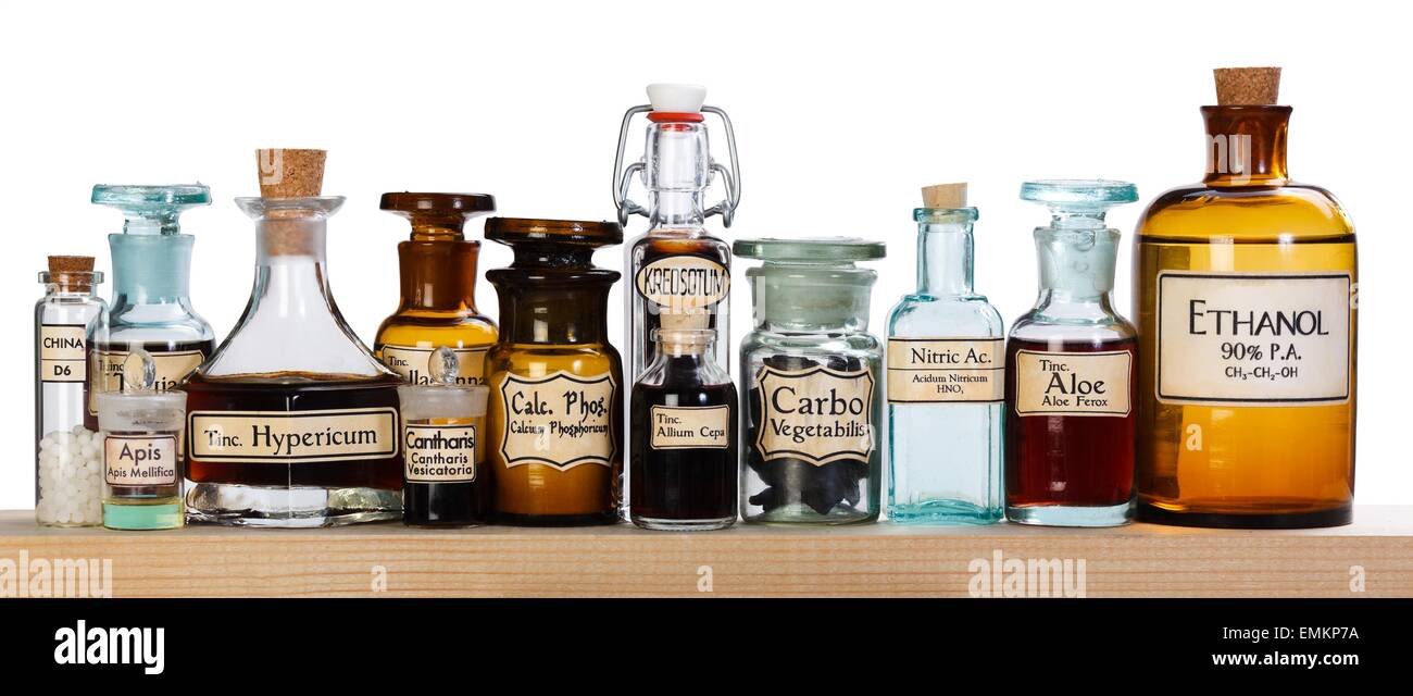Various pharmacy bottles of homeopathic medicine on wooden board Stock ...