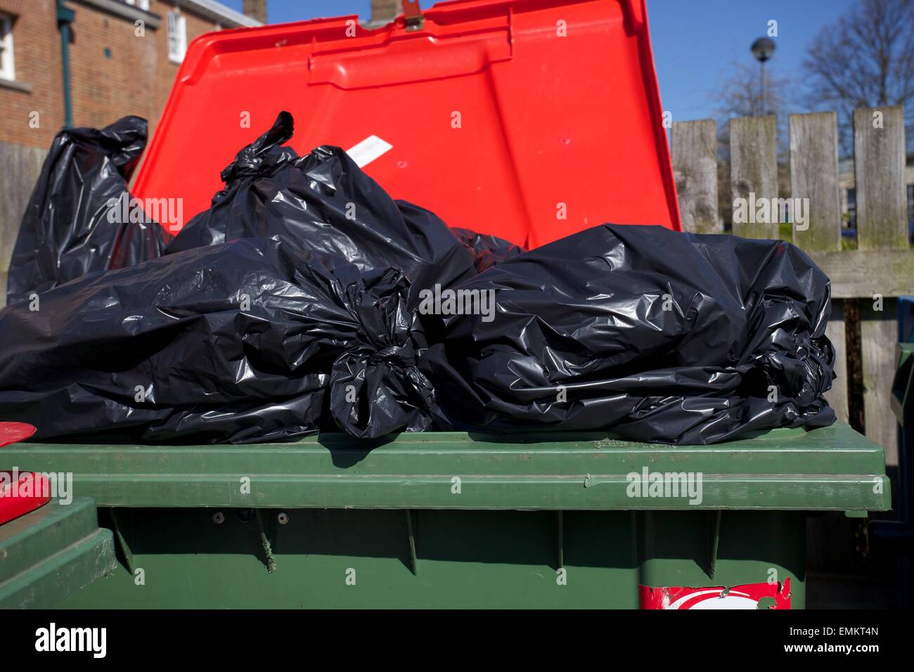 recycle bins full of rubbish Stock Photo - Alamy