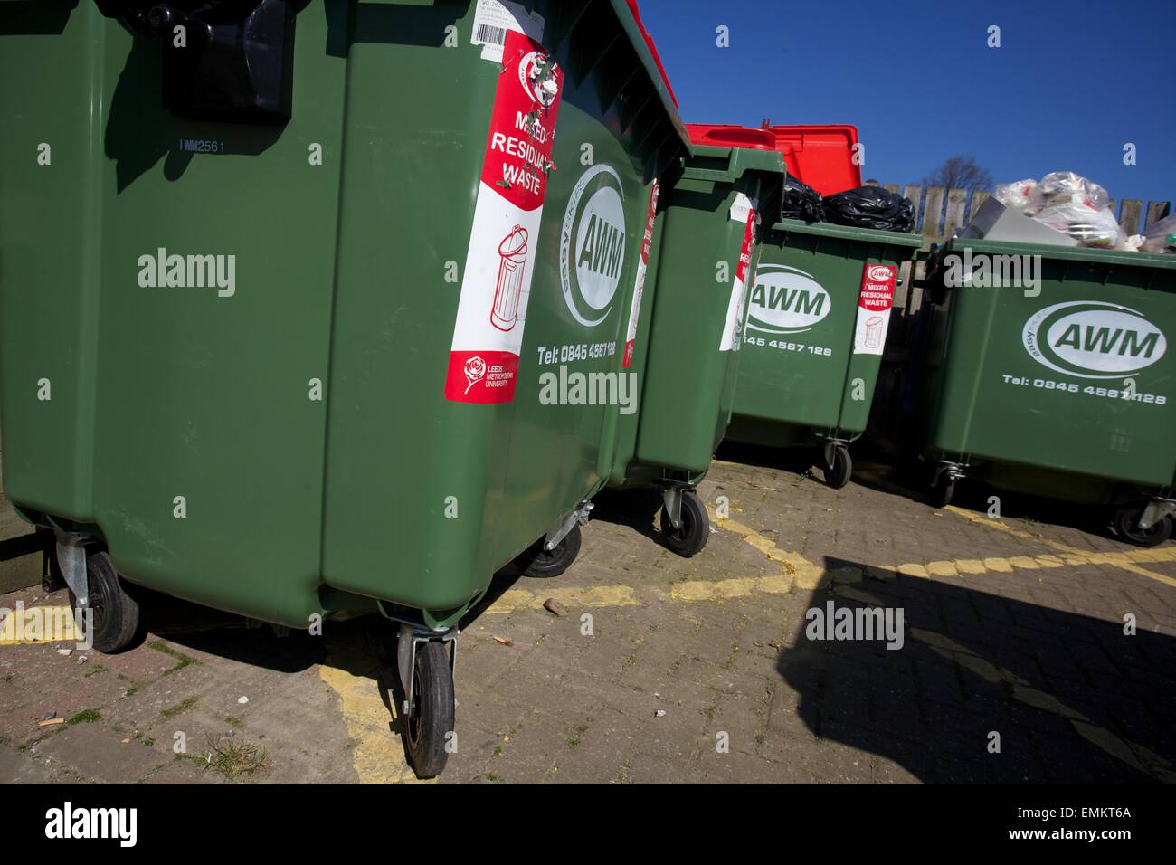 recycle bins full of rubbish Stock Photo - Alamy
