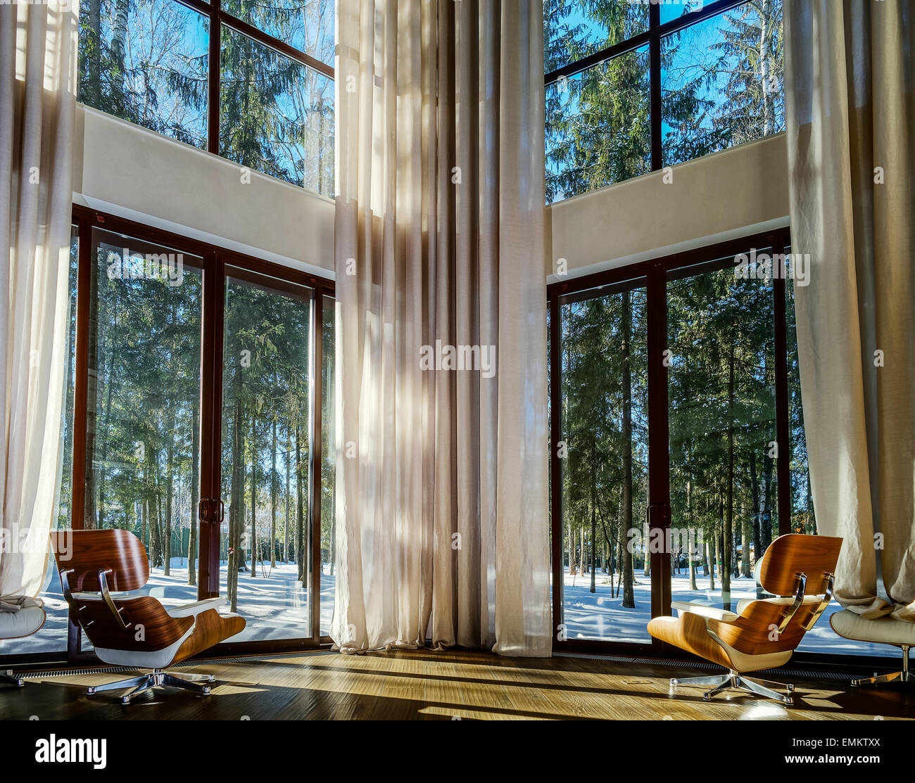 Modern rest room in new house. Sunny day. Big fiberglass windows Stock ...