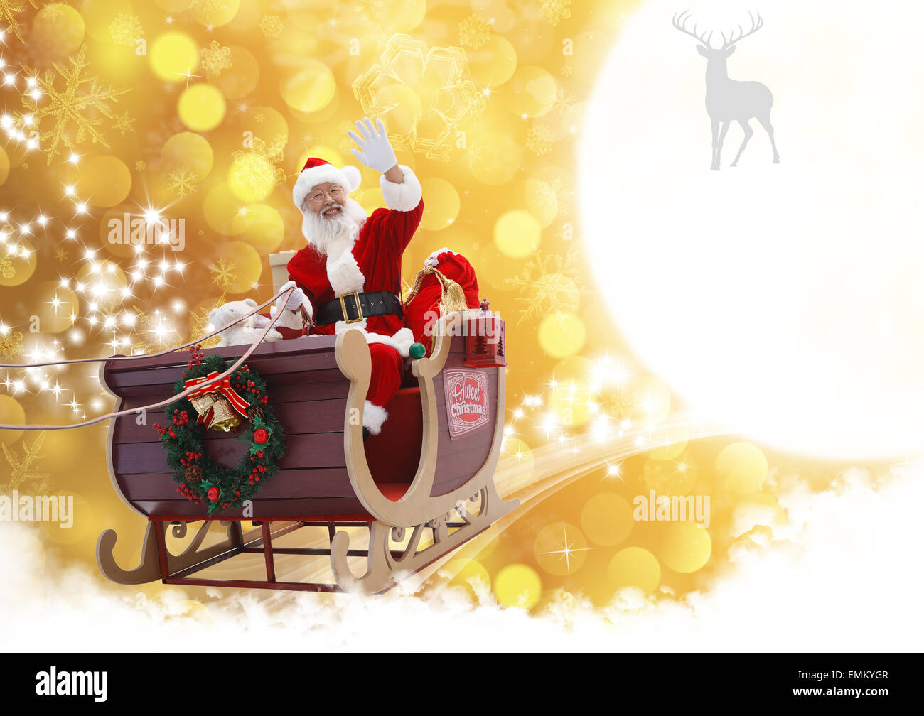 Santa Claus rides the sled to send a gift Stock Photo - Alamy