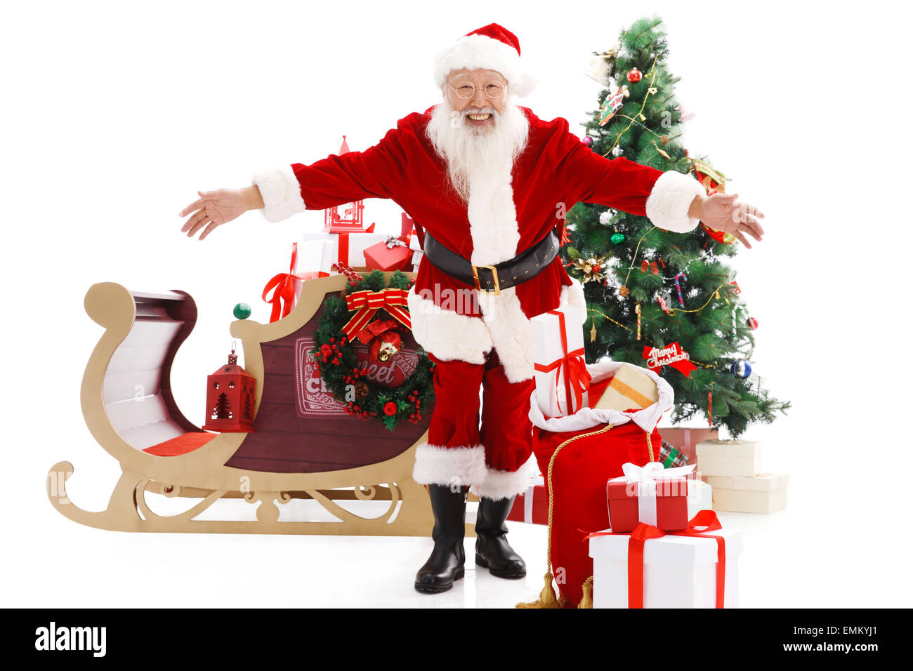 A Santa Claus and Christmas gifts Stock Photo - Alamy