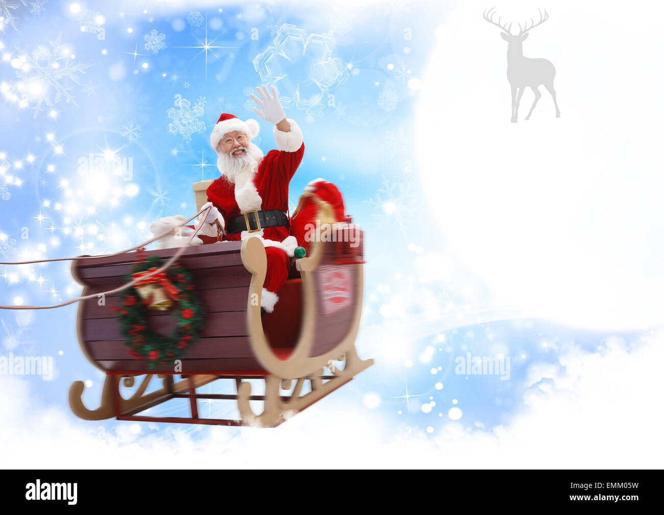Santa Claus rides the sled to send a gift Stock Photo - Alamy