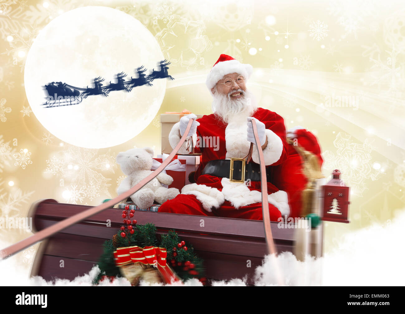 Santa pulling full sleigh hi-res stock photography and images - Alamy