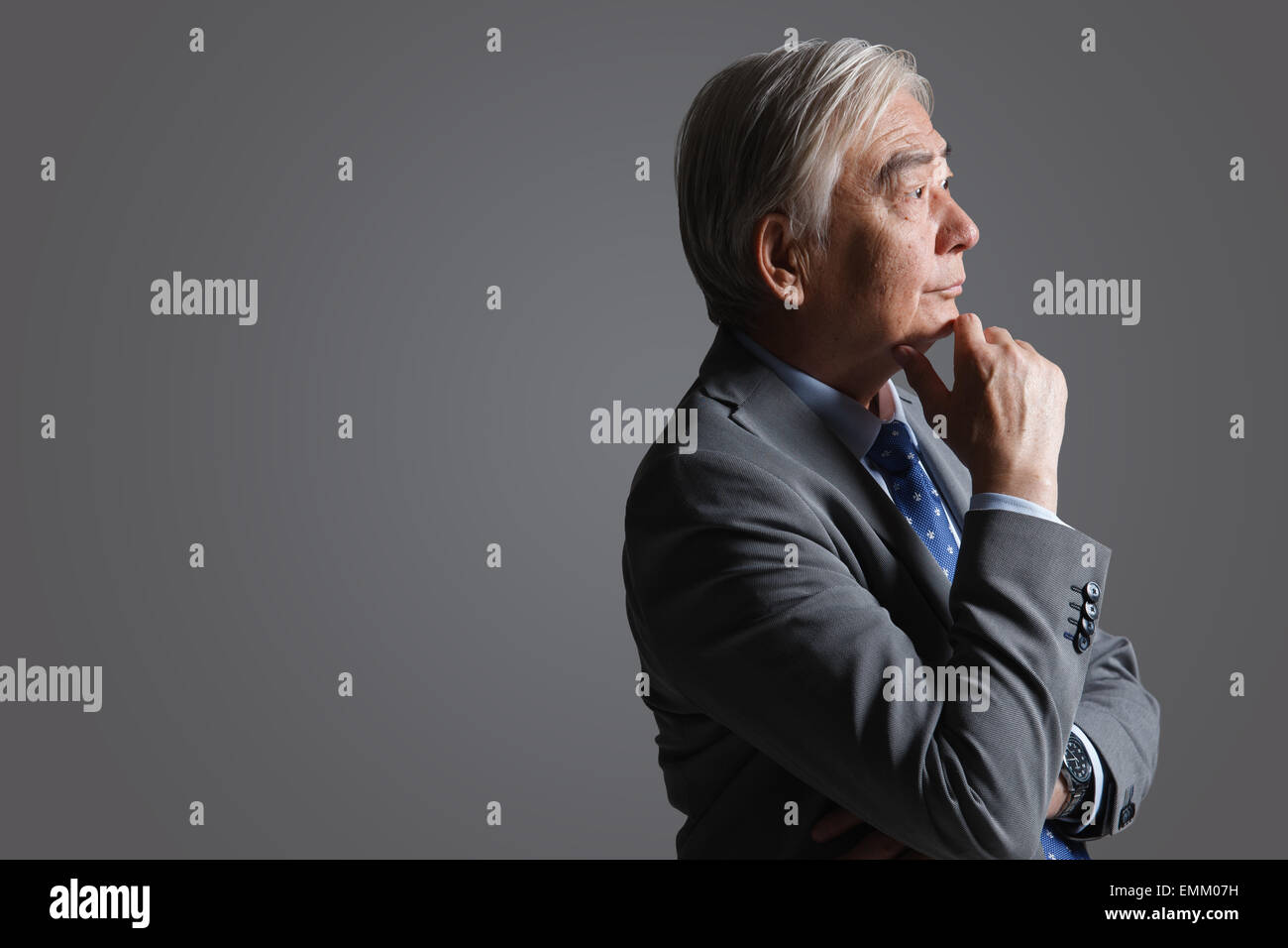 A successful old man thinking Stock Photo - Alamy
