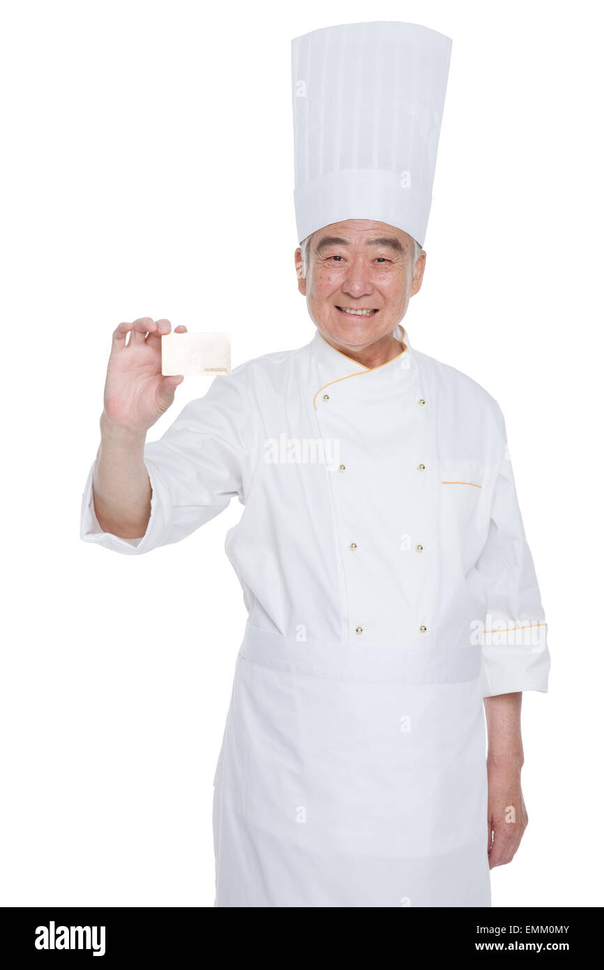 The old man wearing chef clothing with a card Stock Photo - Alamy