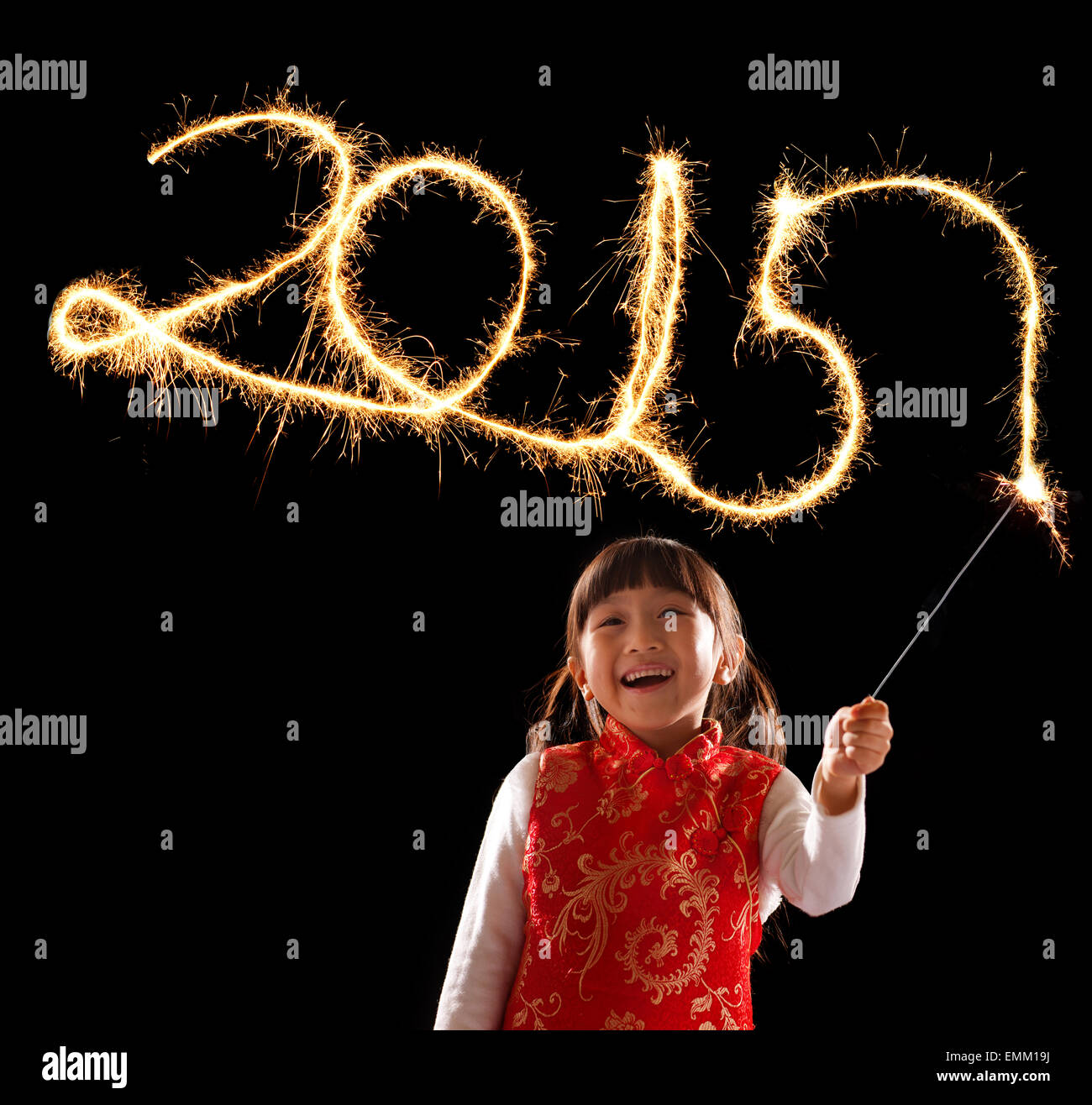 A little girl holding a fireworks Stock Photo - Alamy