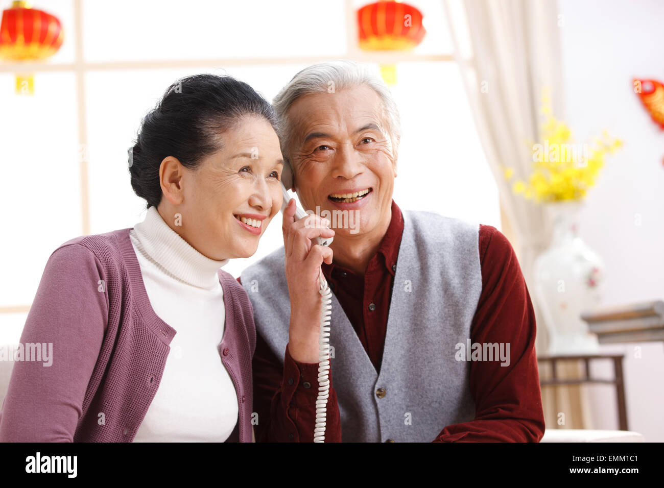 The old couple new year call Stock Photo - Alamy
