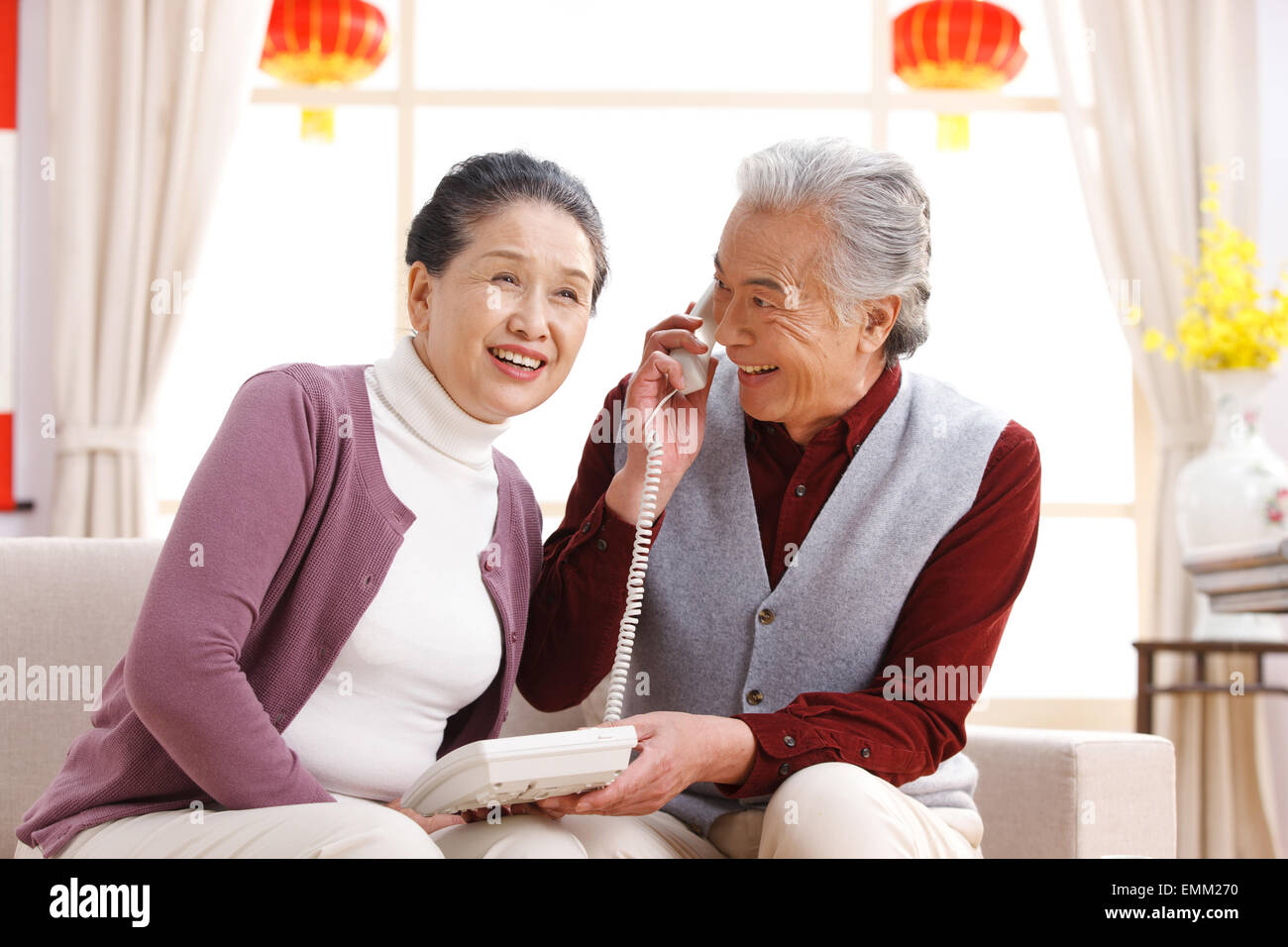 The old couple new year call Stock Photo - Alamy
