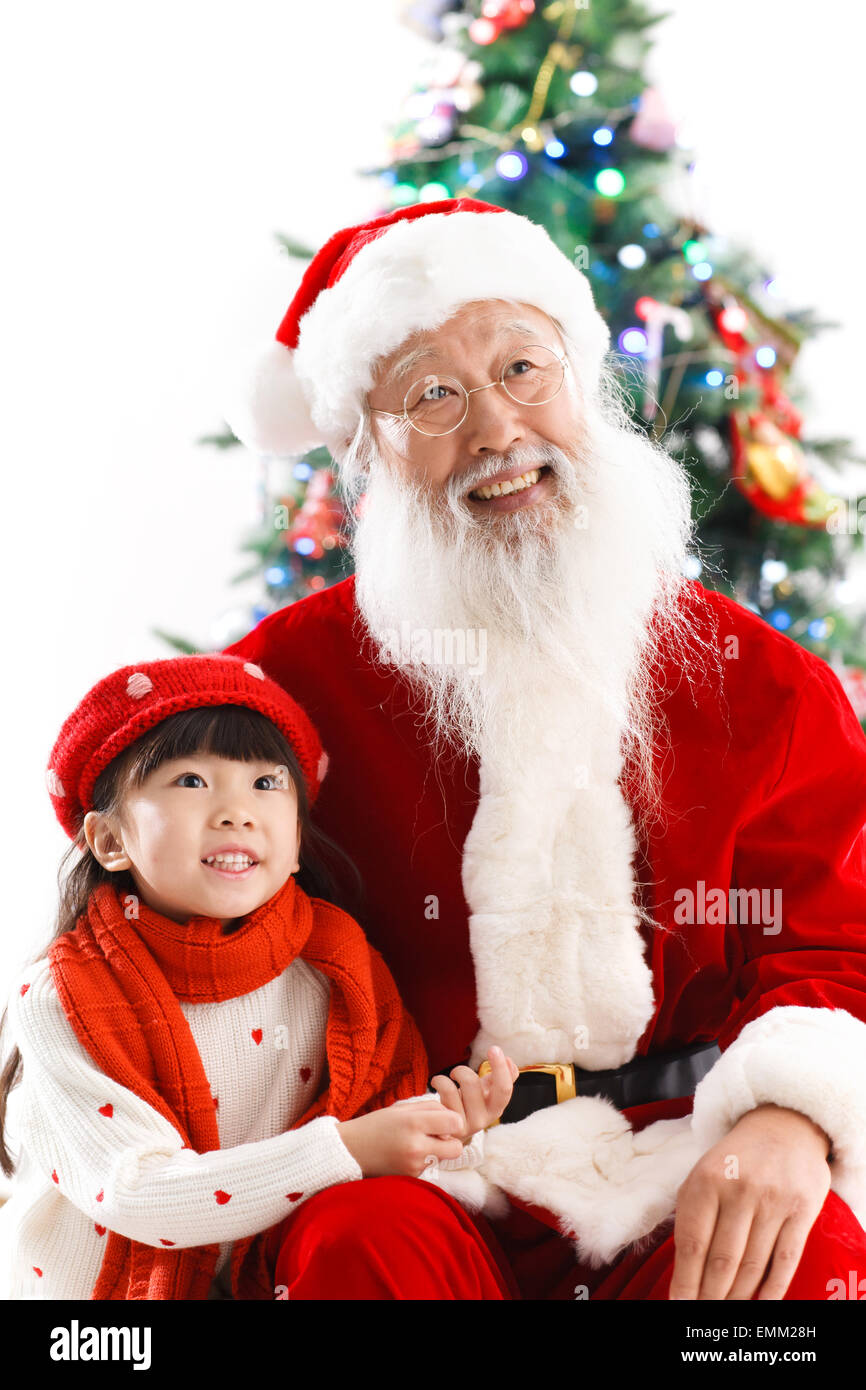 Santa and the little girl for Christmas Stock Photo - Alamy