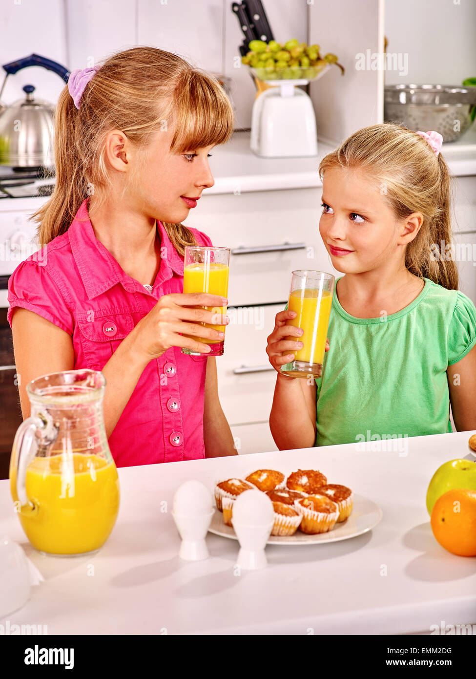 Children breakfast at kitchen Stock Photo - Alamy