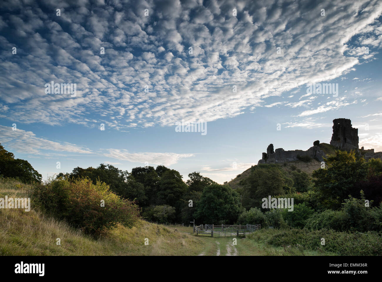 Stunning sunrise landscape over ruins of medieval castle Stock Photo ...