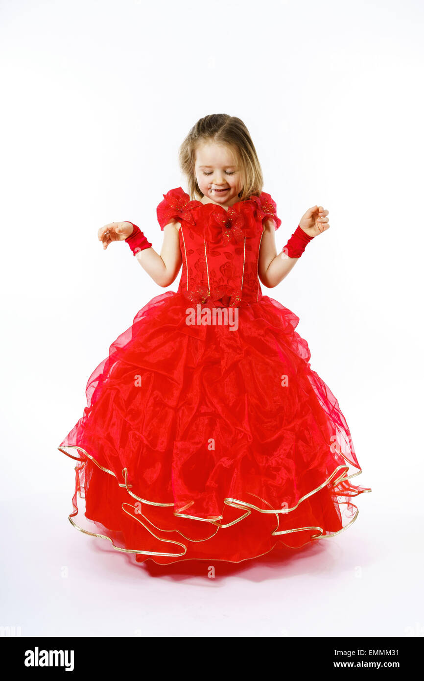Cute little princess dressed in red dancing. Isolated on white ...