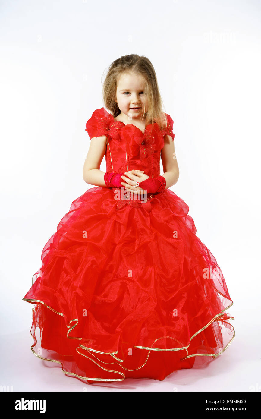 Cute little princess dressed in red dancing. Isolated on white ...
