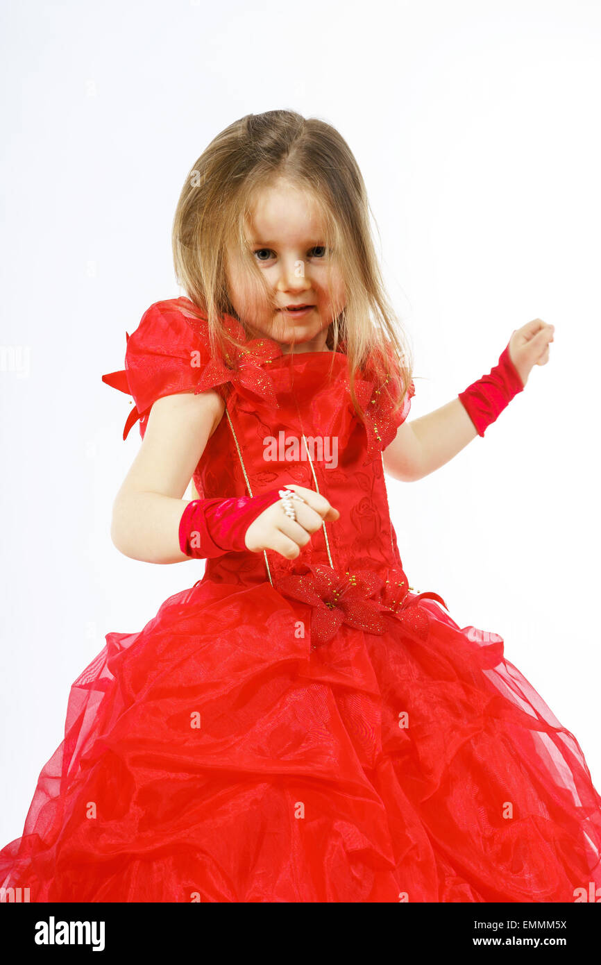 Cute little princess dressed in red dancing. Isolated on white ...